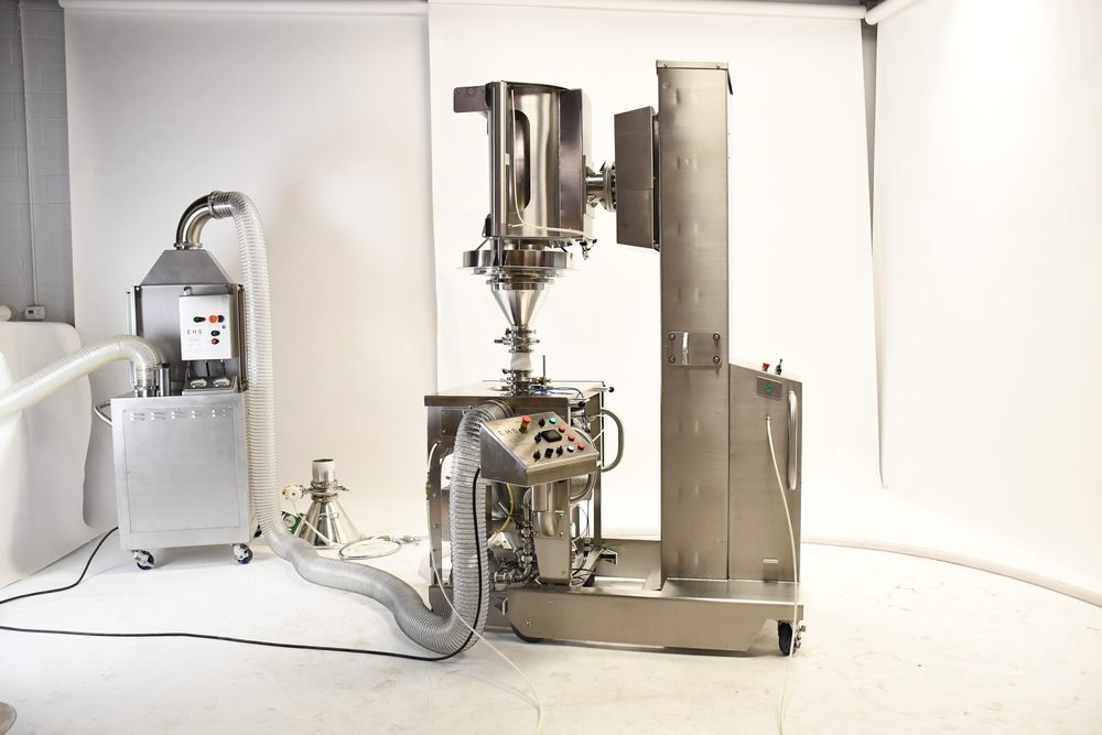 Material Transfer Station with Vacuum Conveyance - Rheo Engineering