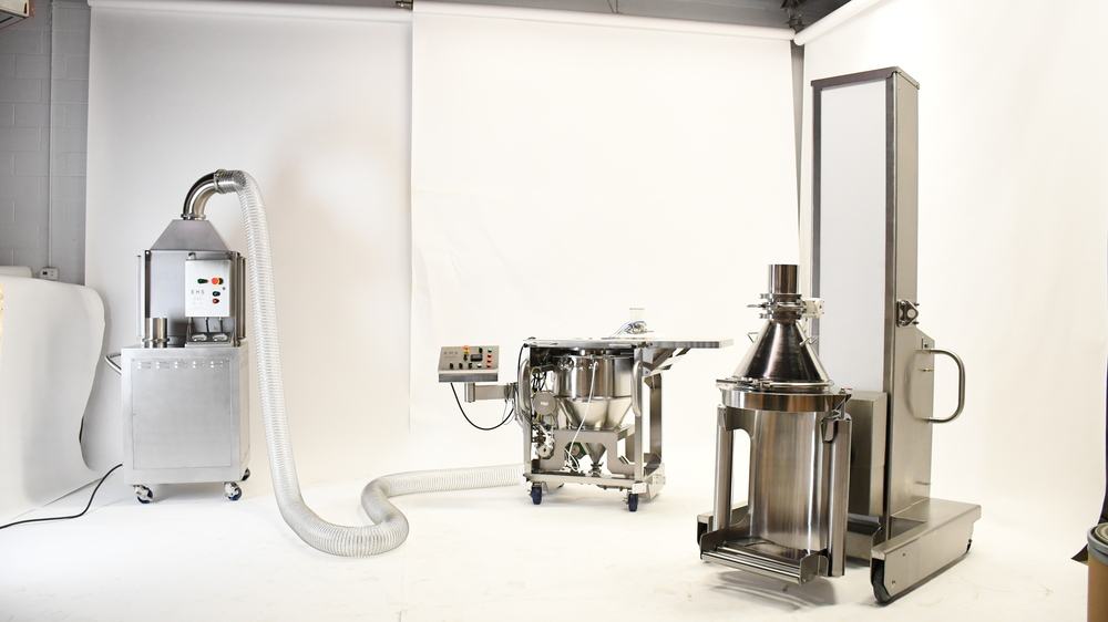 Material Transfer Station with Vacuum Conveyance - Rheo Engineering